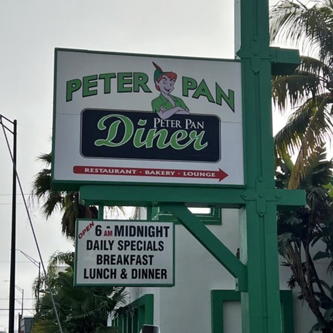 The sign promises what Florida needs: a place where breakfast is served all day and Peter Pan's spirit of eternal youth lives on.