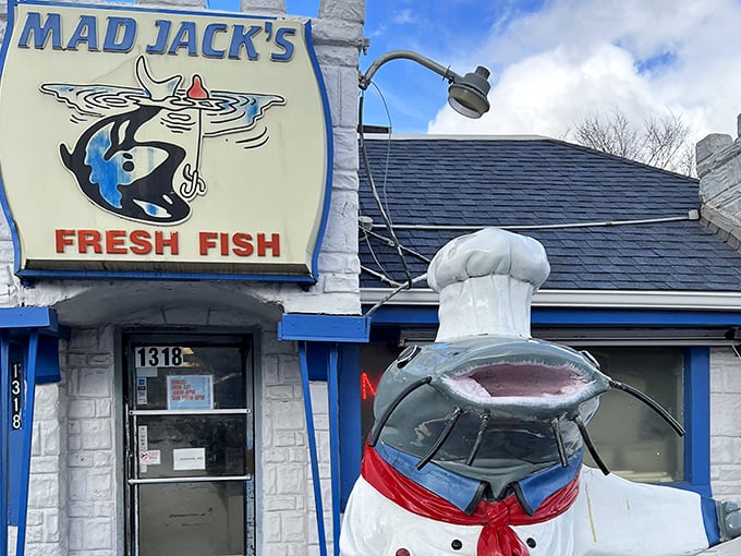 The iconic sign and catfish chef &ndash; Mad Jack's unmistakable calling card. This local landmark has guided hungry seafood lovers to flavor paradise for years.