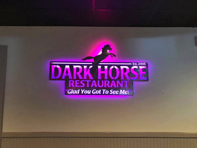 The illuminated sign glows with purple promise, like a beacon guiding hungry travelers to a port of culinary salvation in Findlay.