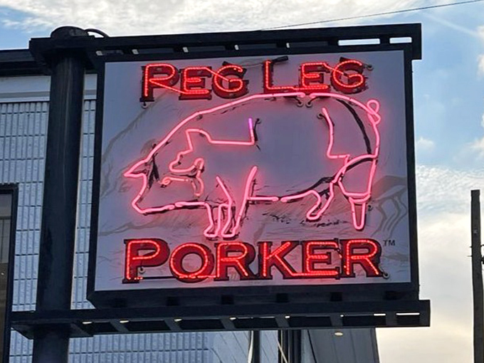 That neon pig sign burns bright against the Tennessee sky, a beacon of hope for the hungry and barbecue faithful.