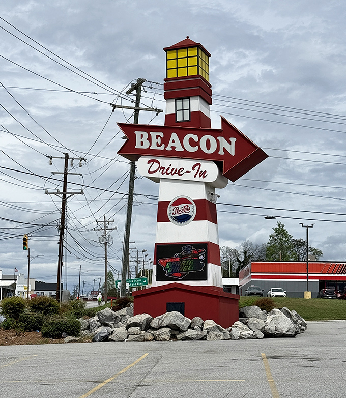 The lighthouse-inspired sign stands tall like a beacon (pun absolutely intended) guiding hungry travelers to this temple of Southern comfort food.
