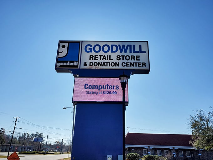 Against a brilliant blue sky, the Goodwill sign advertises computers starting at $129.99&mdash;proof that technology doesn't have to break the bank.