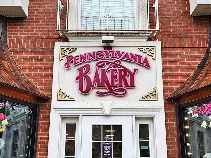 That signature sign, with its bold magenta lettering, isn't just a logo—it's a promise of the sweetness that awaits inside.