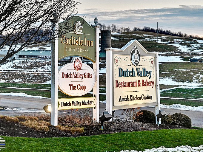 The roadside sign stands as a beacon of hope for hungry travelers, promising Amish Kitchen Cooking just when you need it most.
