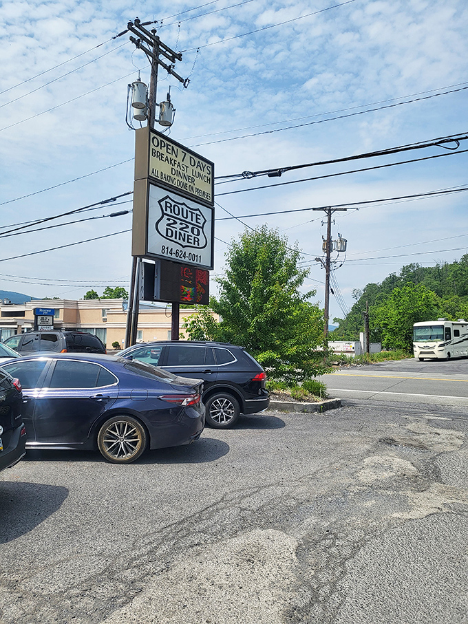 The roadside sign announces "Open 7 Days" &ndash; six words that have saved countless road trips and Sunday morning hunger emergencies across Pennsylvania.