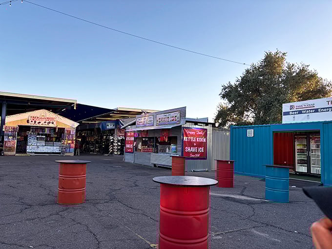 Snack stands offer respite for weary shoppers, with shaved ice and cold drinks promising relief from the Arizona heat between bargain hunts.