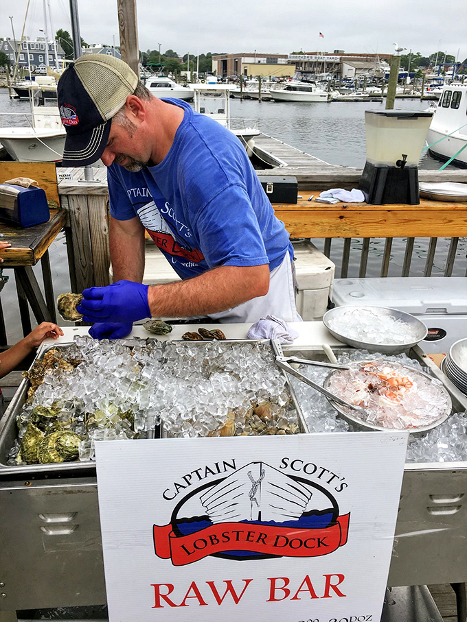 Where the magic happens&mdash;Captain Scott's raw bar, where oysters meet their destiny at the hands of skilled shuckers.