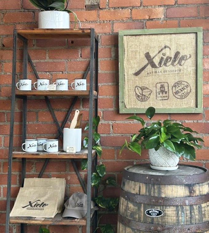 Merchandise corner: where you can take a piece of Xielo home. Those mugs aren't just for coffee—they're daily reminders of your best food decisions.