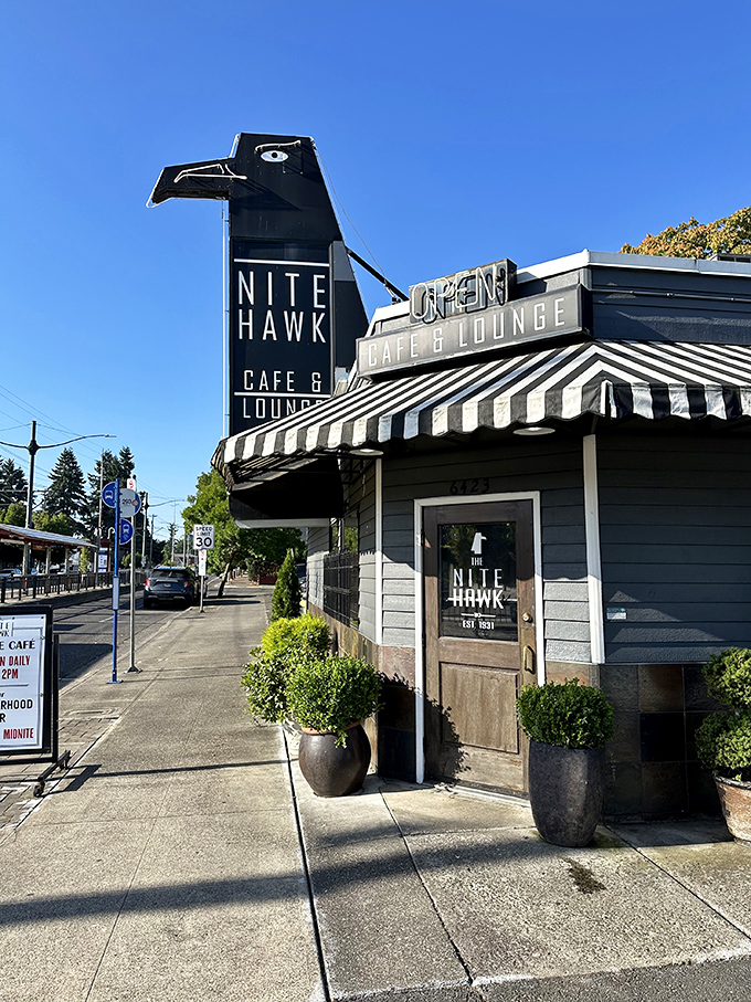 The storefront stands like a beacon of breakfast hope on a Portland morning. That hawk isn't just watching&mdash;it's inviting you in.
