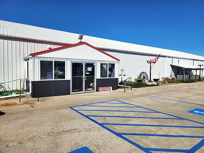 Morning sunshine highlights the entrance to this temple of treasures. The "ANTIQUES" sign is less an advertisement and more a siren call to the curious.