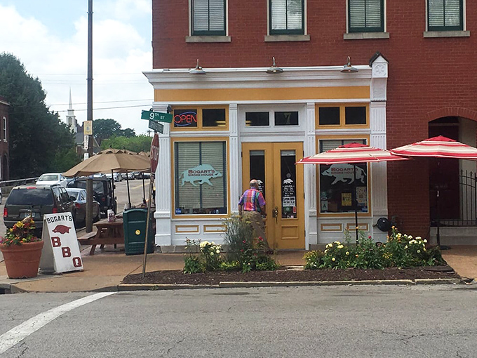 The yellow door to flavor town! Bogart's charming storefront stands like a beacon of barbecue hope on its Soulard corner, promising smoky delights within.