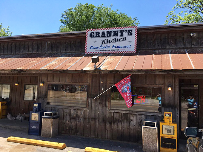 Morning sunshine highlighting what might be the most honest restaurant sign in America. No pretense, just a promise of home cooking.