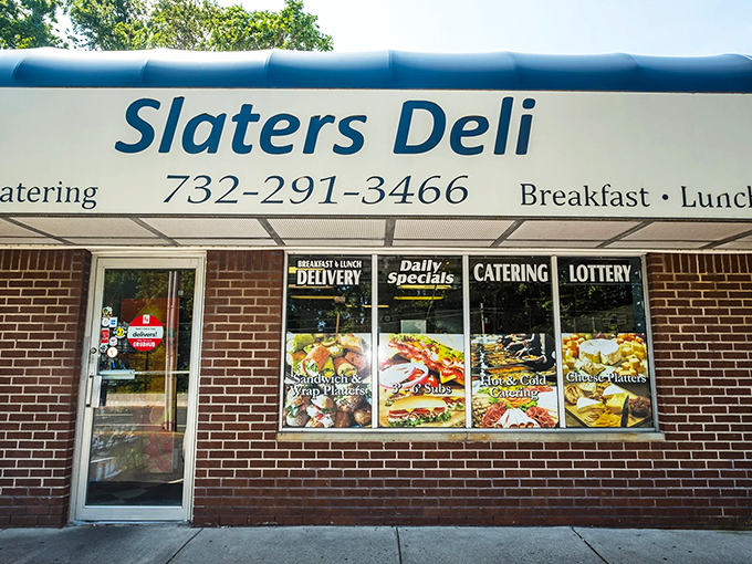 The promise of deliciousness advertised in full color. This storefront doesn't just announce a deli &ndash; it's a beacon of hope for the hungry traveler.