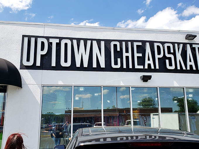The name says it all. Uptown Cheapskate's bold signage against the bright Louisiana sky promises upscale style without the upscale price tag.