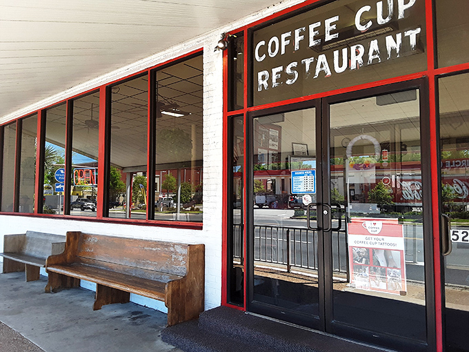 The entrance that promises comfort and satisfaction. That wooden bench outside has heard more "that was amazing" comments than a Broadway show.