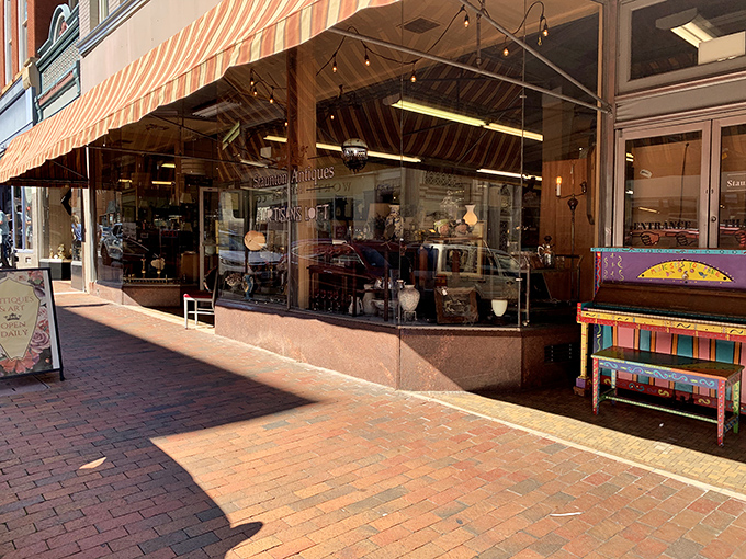 That colorful piano outside is the perfect teaser for the kaleidoscope of treasures waiting inside this historic storefront.