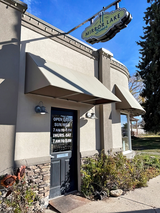 The sign promises "OPEN DAILY"&mdash;three syllables that sound like music when you're hungry and the mountains have worked up your appetite.