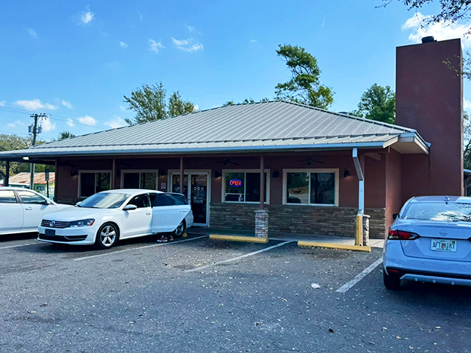 No-frills exterior, metal roof, and the promise of barbecue that doesn't need fancy architecture to impress. The smoke does all the talking.