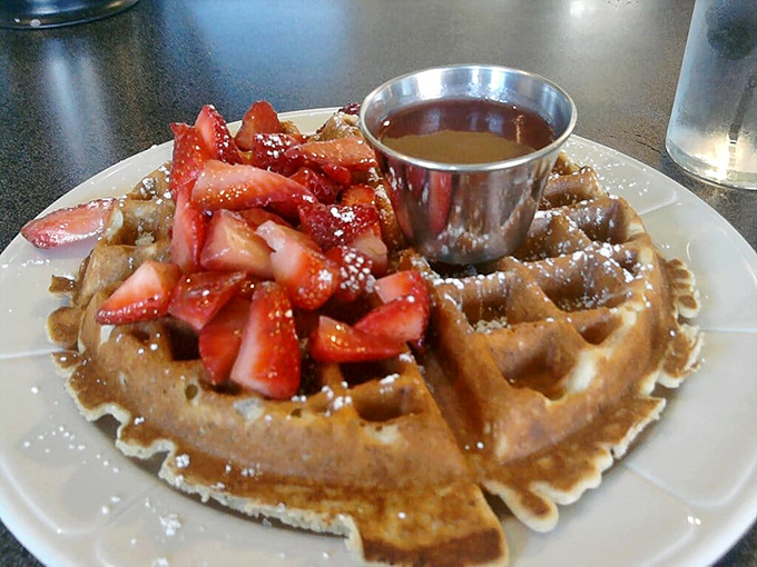This waffle isn't just breakfast&mdash;it's a strawberry-topped pedestal that makes you question why we don't eat like this every morning.