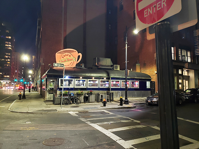 At night, the diner glows like a time machine, ready to transport you to a world where calories don't count after midnight.