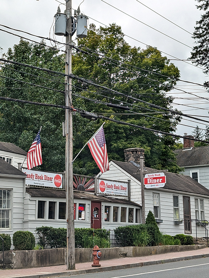 The street view reveals American flags proudly displayed—this isn't just a diner, it's a neighborhood institution standing proudly on Church Hill Road.