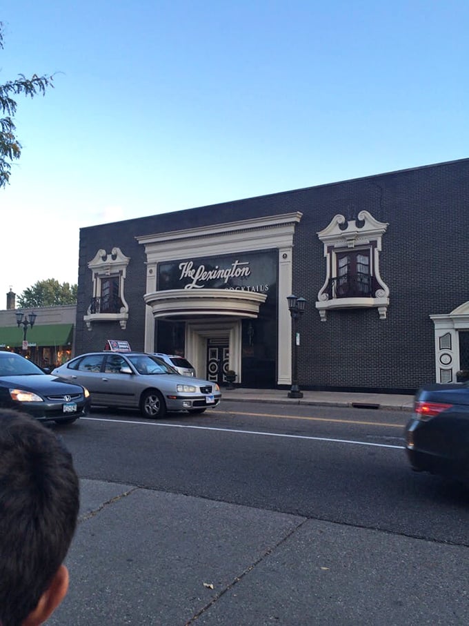 Evening approaches as The Lexington's illuminated sign becomes a beacon for those seeking culinary refuge from ordinary dining.
