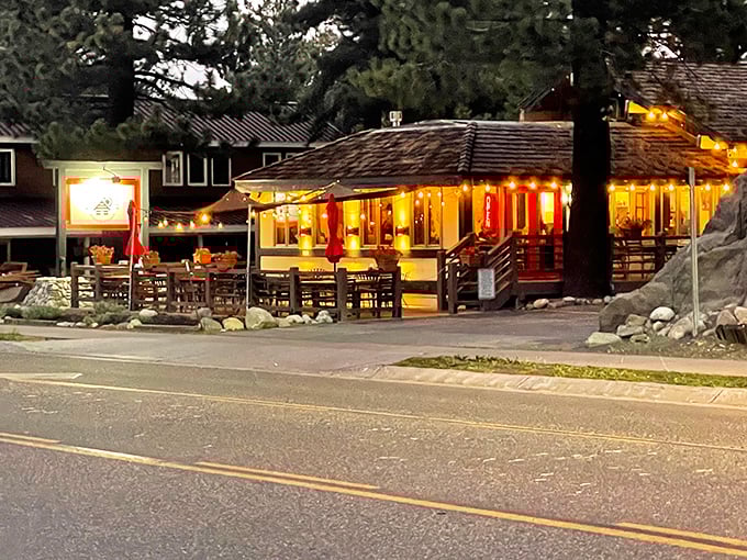 As evening falls, The Warming Hut glows like a beacon for hungry travelers&mdash;a mountain jewel wrapped in twinkling lights.