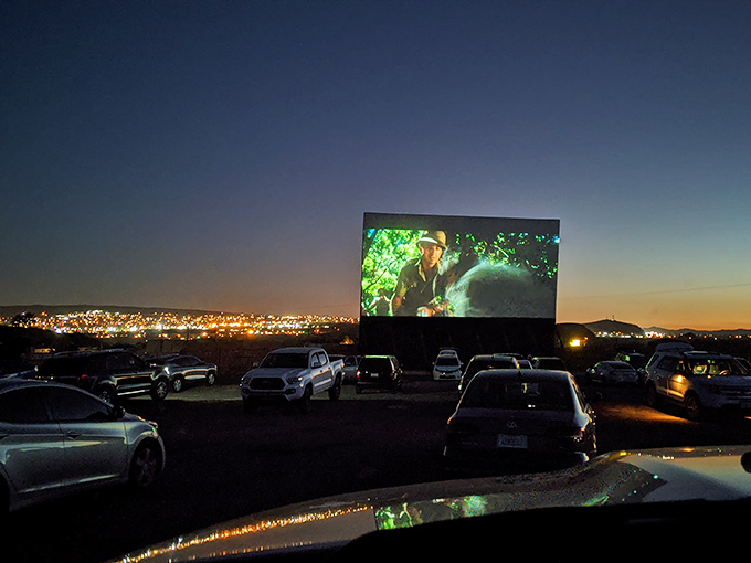 As twilight fades to darkness, the real show begins&mdash;movies under the stars with city lights twinkling in the distance.