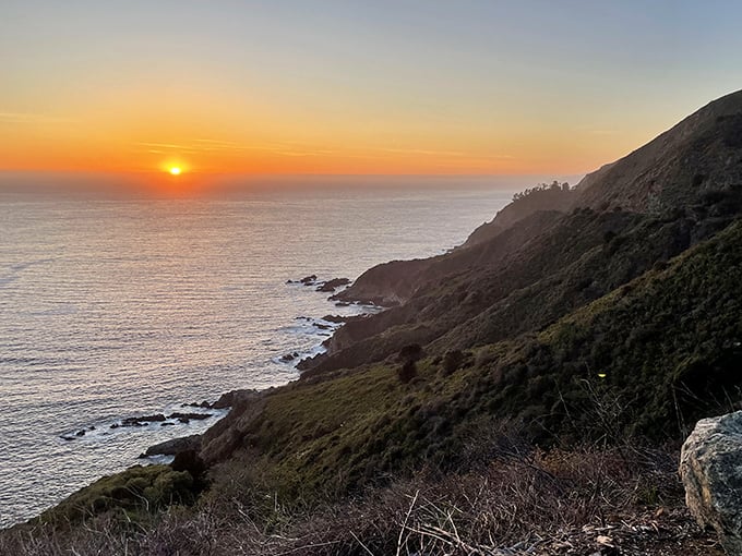 The sun taking its final bow of the day over the Pacific. Even the most jaded travelers fall silent before this nightly spectacle.