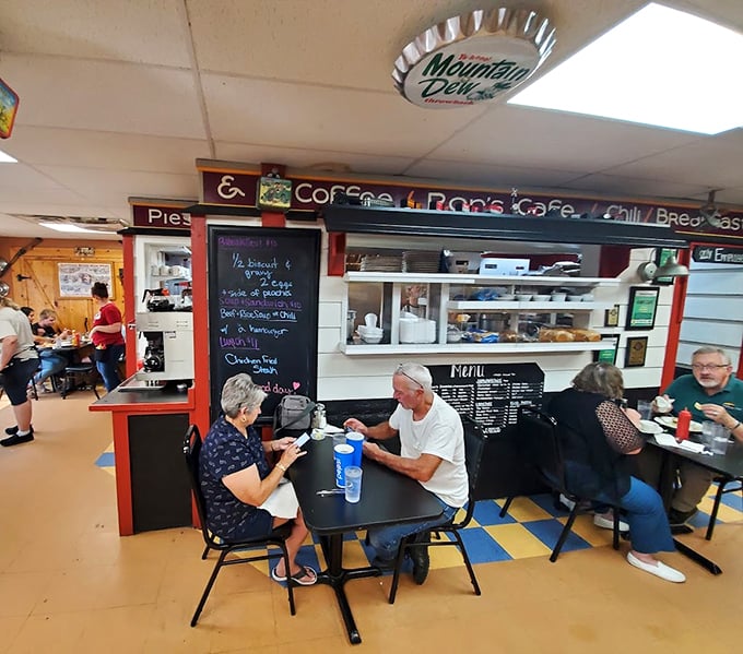 The counter area&mdash;where coffee flows freely and breakfast dreams come true. That Mountain Dew ceiling fixture? Just one more quirky touch that makes Ron's uniquely Ron's.