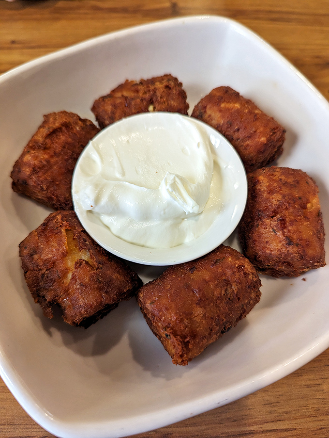 Golden-brown tavern tots surrounding a pool of sour cream&mdash;like delicious little sentinels guarding the most delightful dip in Ohio.