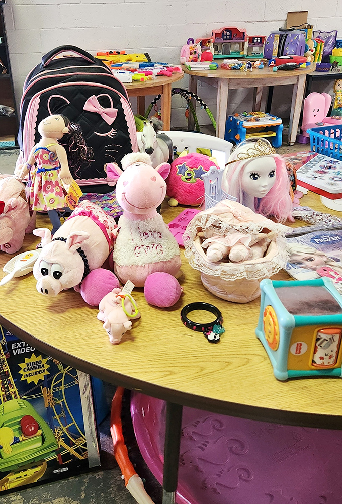 A cheerful children's section with toys and stuffed animals, where parents can outfit playrooms without emptying their savings accounts.