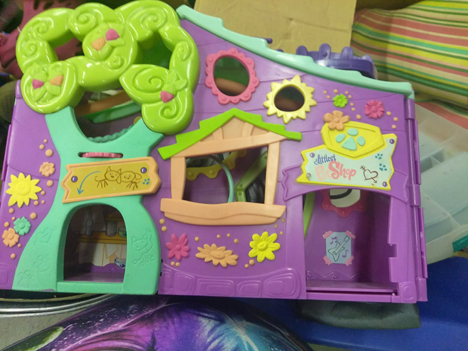 Childhood nostalgia in plastic form! This colorful playhouse reminds us that imagination doesn't need batteries or Wi-Fi to work its magic.