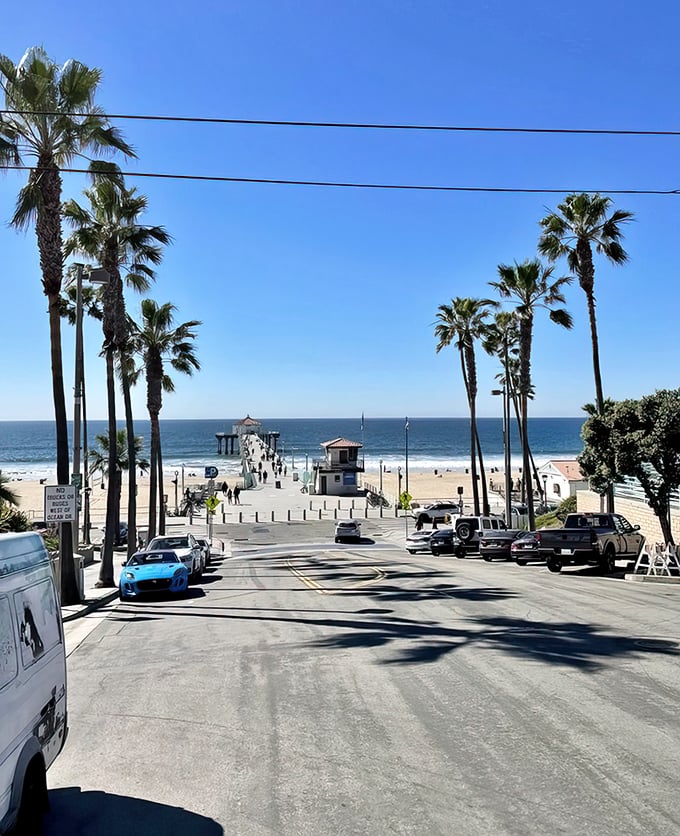 This is what you came for&mdash;Manhattan Beach in all its palm-tree-lined glory, with that iconic pier stretching toward the horizon like a runway for dreams.