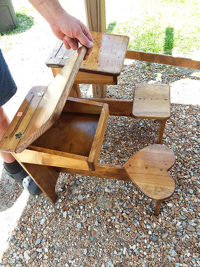 A childhood desk that's survived generations of homework sessions. That heart-shaped seat has comforted countless young scholars through multiplication tables.