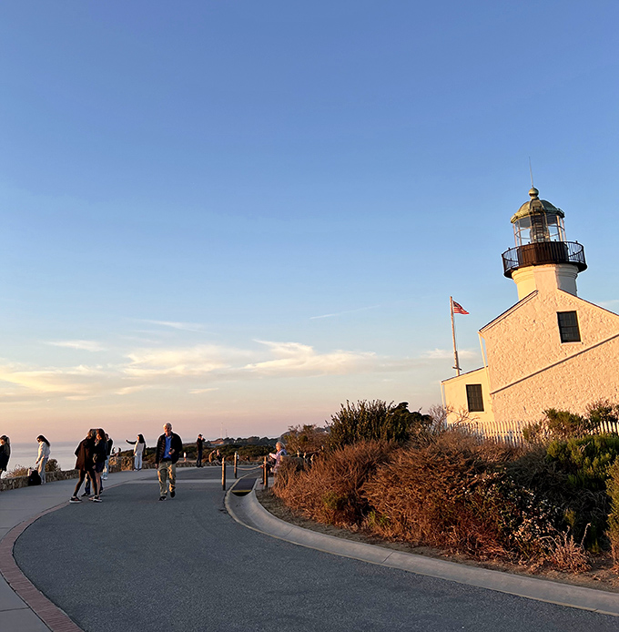 Sunset pilgrims gather at day's end, drawn by the timeless combination of historic architecture and nature's daily light show.