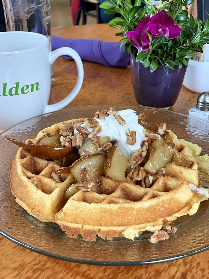 This waffle isn't just breakfast&mdash;it's an architectural achievement topped with caramelized apples and pecans that would make Frank Lloyd Wright jealous.