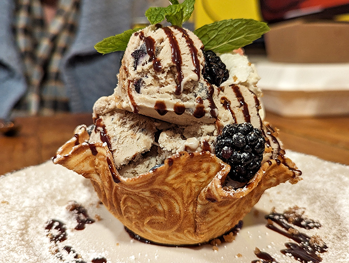 Ice cream in a homemade waffle bowl&mdash;because at The Range, even dessert refuses to be ordinary. That mint leaf is the green flag signaling "Go!"
