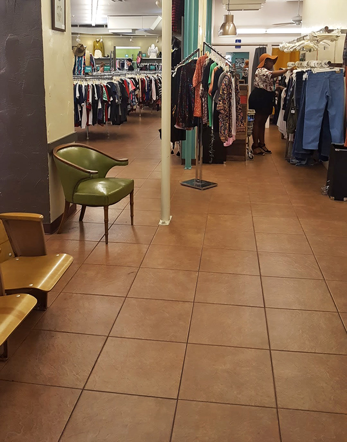 Mid-century chairs offer respite for weary shoppers or patient partners waiting for the fashion magic to happen.