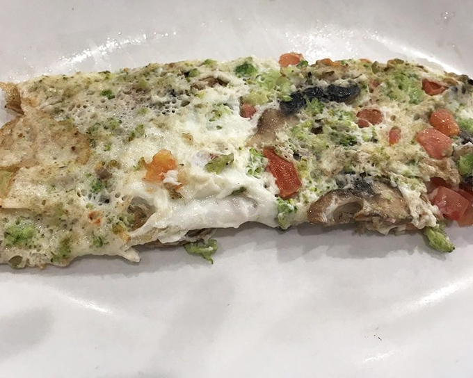 A veggie-packed egg white omelet that somehow makes healthy eating feel indulgent&mdash;the diner's nod to modern appetites.