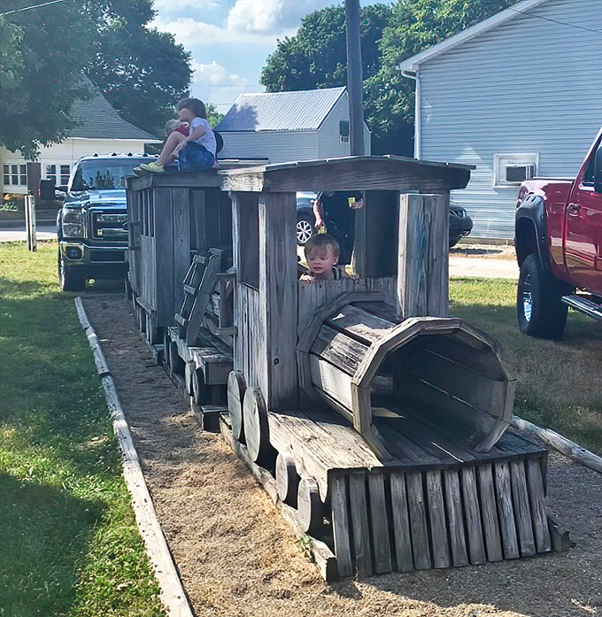 Handcrafted wooden train play structures delight young engineers while teaching the value of imagination over high-tech entertainment.