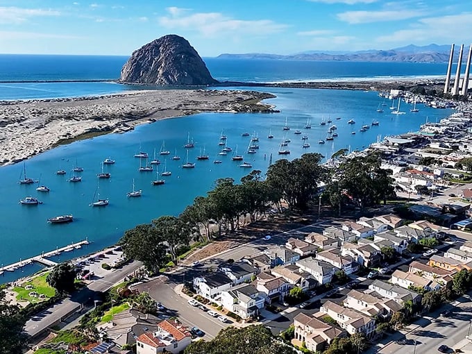 Morro Rock stands like a ancient guardian watching over this working harbor filled with boats and dreams.