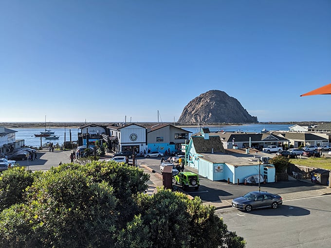 The famous volcanic rock dominates the skyline of this authentic fishing village where tradition meets natural beauty.