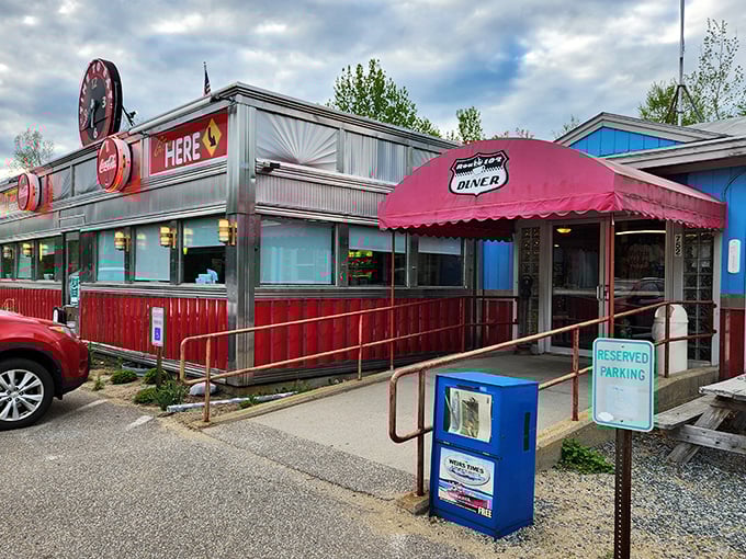 The classic 104 Diner gleams in the New Hampshire sunshine, its red trim and vintage clock promising comfort food and nostalgia by the plateful.