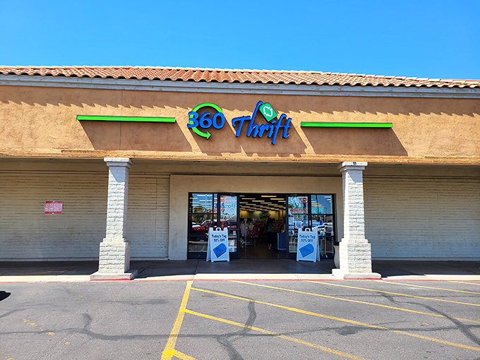 The bright blue and green 360 Thrift sign promises treasure hunting adventures behind those wide-open doors.