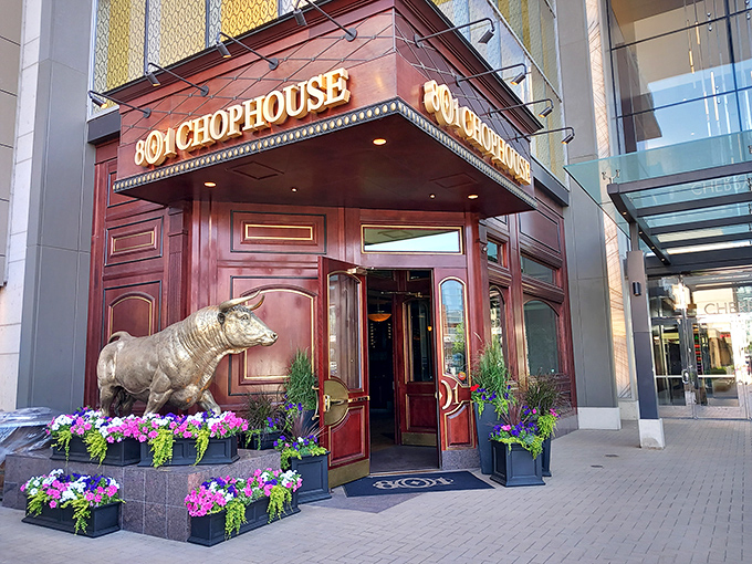 That bronze bull outside isn't just decoration – it's a promise of the prime beef waiting inside this Denver steakhouse.