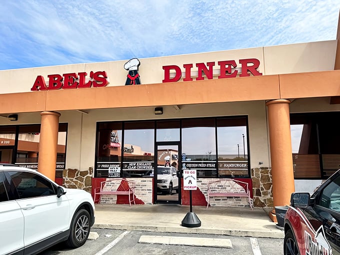 Abel's Diner welcomes you with that classic red signage &ndash; where the chef hat logo practically whispers "trust me, I know what your breakfast needs."