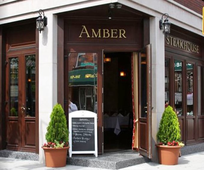 That welcoming corner entrance practically begs you to step inside and discover Brooklyn's best-kept steak secret.