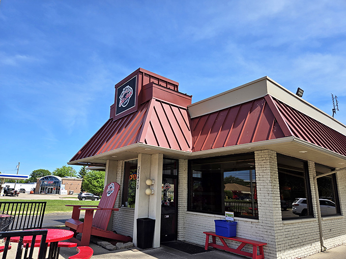 The iconic red roof of Anchor Bay Pit Stop Diner beckons hungry travelers like a lighthouse for the breakfast-starved.