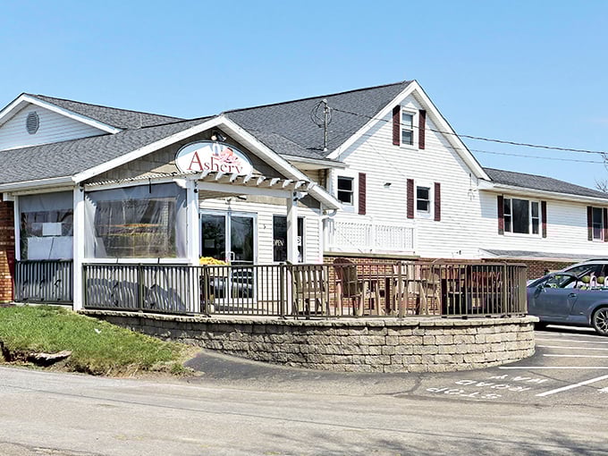 That welcoming front porch practically begs you to sit and watch the world go by.
